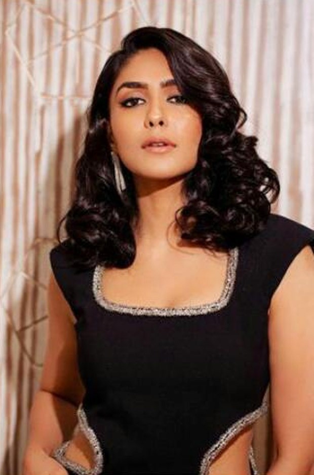 Mrunal Thakur dons a Prabal Gurung black midi dress with waist cut outs ...